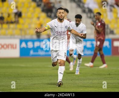Rodrigo Tabata (12) of Al Sadd passes the ball during the QNB Stars ...