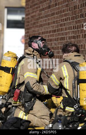 Firefighters in breathing apparatus BA BASCA are briefed before ...