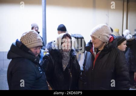Old women cry and hug as they arrive safely in Poland. Refugees from ...
