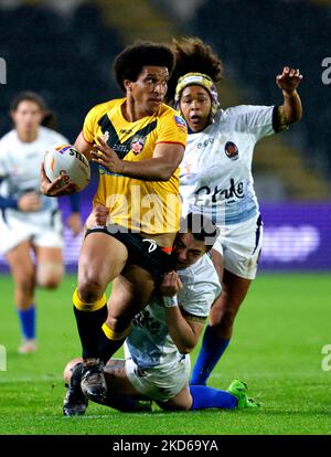 Elsie Albert of PNG is tackled during the Pacific Test Invitational ...