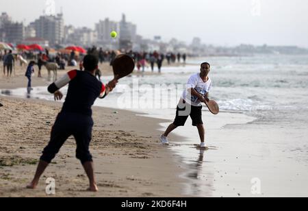 Palestinians enjoy a summer day at the beach of Gaza City, Saturday ...
