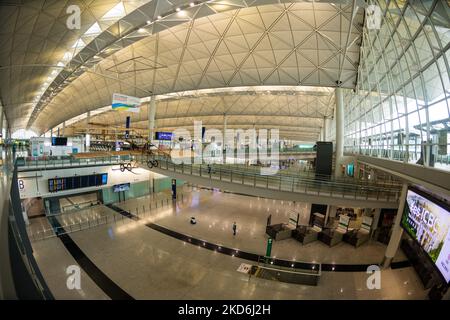 Hong Kong, China, 2 Apr 2022, A young lady runs across a street in ...
