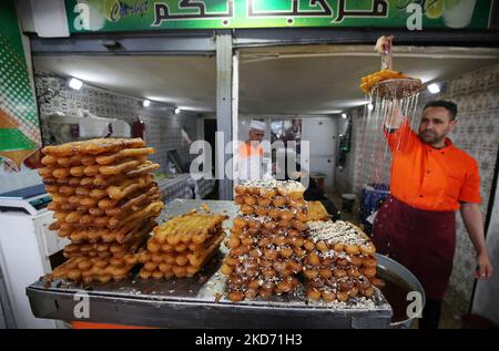 A special dessert called 'zalabia' at a pastry shop in Boufarik ...