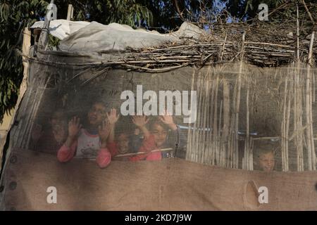 Palestinian children play next their house in Beit Hanoun, near the ...