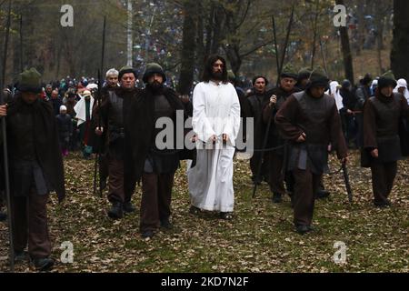 An actor dressed as Jesus Christ attends the Way of the Cross during ...