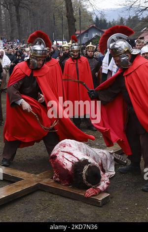 An actor dressed as Jesus Christ attends the Way of the Cross during ...