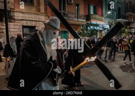 The first crucifer makes a bow in front of a tomb in Noicattaro on ...