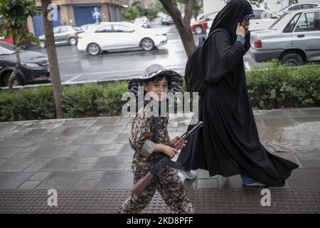 An Iranian schoolboy wearing an Islamic Revolutionary Guard Corps (IRGC ...