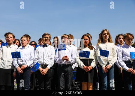 Children hold EU flags while singing the European anthem 'Ode to Joy ...
