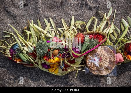 Offering like food and fruit is seen during the Melasti, a purification ...