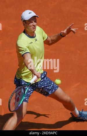 Hubert Hurkacz of Poland plays a in their quarter-final match against ...