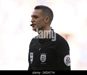 Craig Pawson the referee during the Emirates FA Cup Third Round match ...