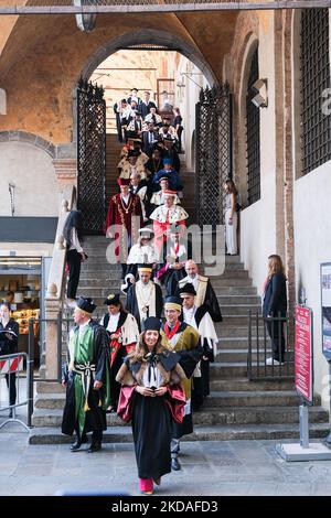 professors with historical clothes parade through the streets of the ...