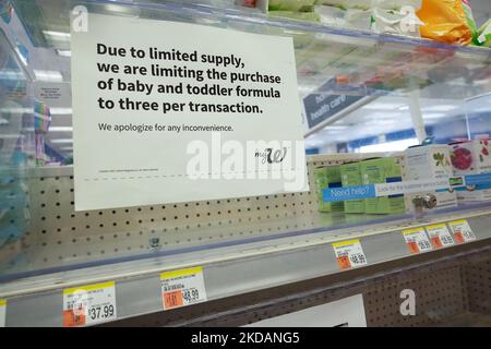 Nearly empty shelves in the baby formula aisle of a grocery store in ...