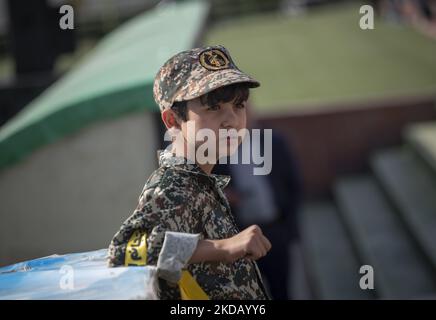 An Iranian schoolboy wearing an Islamic Revolutionary Guard Corps (IRGC ...