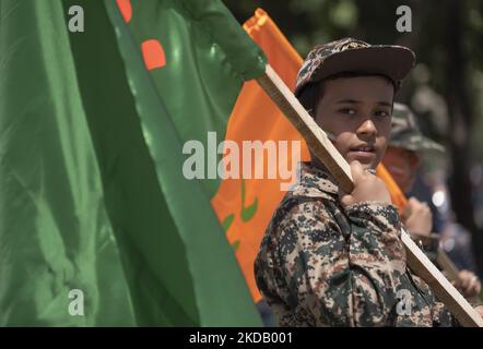 An Iranian schoolboy wearing an Islamic Revolutionary Guard Corps (IRGC ...