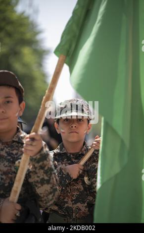 An Iranian schoolboy wearing an Islamic Revolutionary Guard Corps (IRGC ...