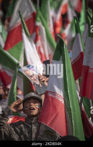 An Iranian schoolboy wearing an Islamic Revolutionary Guard Corps (IRGC ...