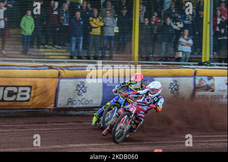 Max Fricke (White) passes Adam Ellis (Red) during the SGB Premiership ...