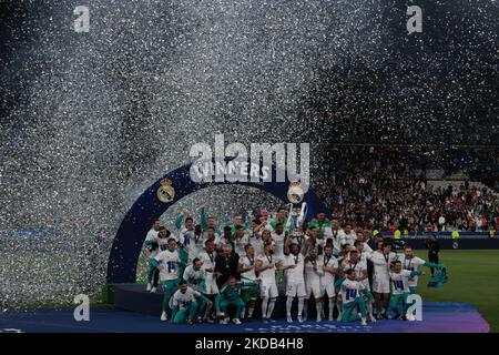 Marcelo of Real Madrid lifts the trophy after winning with his team the ...