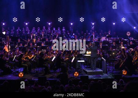 Gavin Greenaway, conducts the Sinfonietta Cracovia Orchestra during the ...