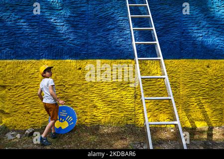 A ladder is seen on International Children's Day during an event ...