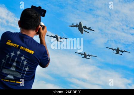 Royal Malaysian Air Force (RMAF) aircraft flying at low altitude in ...