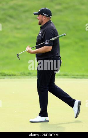 Shane Lowry of Ireland walks off the 18th green after finishing the ...