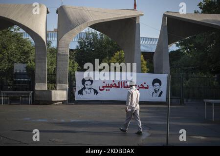A member of the Iranian Basij paramilitary force with face covered ...