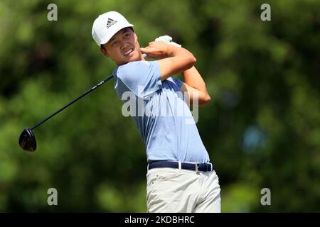 Brandon Wu lines up a putt on the second hole during the first round of ...
