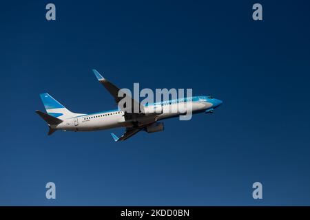 An Aerolineas Argentinas passenger plane takes off from Jorge Newbery ...