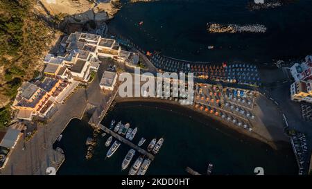 A drone view of Ischia Sant'Angelo at sunrise, in the island of Ischia ...