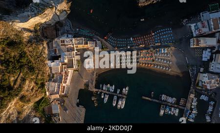 A drone view of Ischia Sant'Angelo at sunrise, in the island of Ischia ...