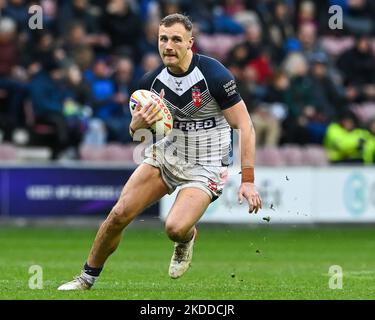 Matty Lees of England makes a break during the Rugby League World Cup ...