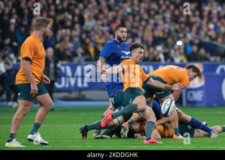 Wallabies' scrum half, Nic White feeds the ball into a Wallabies' scrum ...