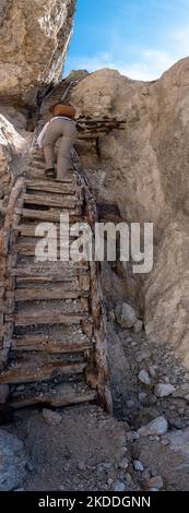 Hiking through fragile limestone rock in the Rienz valley of South ...