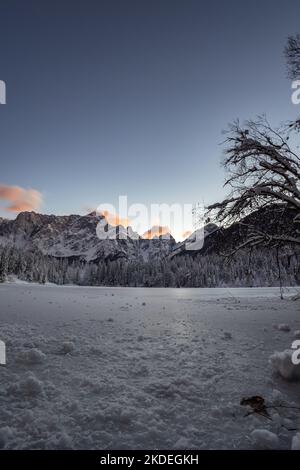 Frosty winter sunset at the lakes of Fusine, Friuli Venezia Giulia ...