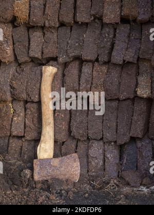 Blocks of peat stacked in croft shed, Mainland Shetland, Shetland Stock ...