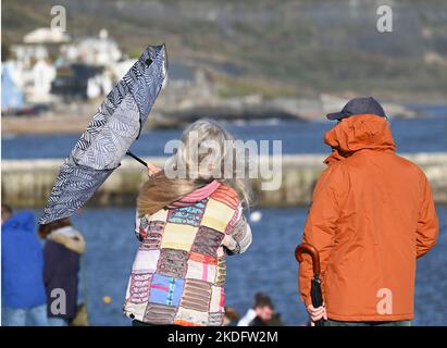 Lyme Regis, UK. 06th Nov, 2022. ON a very windy afternoon with mixed ...