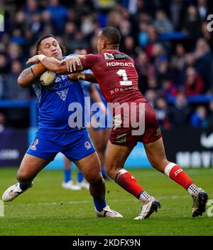 Samoa's Josh Papali'i is tackled by Tonga's Will Hopoate, during the ...