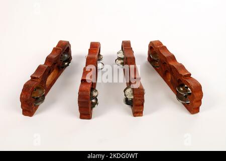 Wooden Khartals, idiophone with jingles in a wooden frame. Folk ...