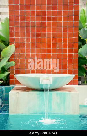 Waterfall jet at the swimming pool on daytime Stock Photo - Alamy