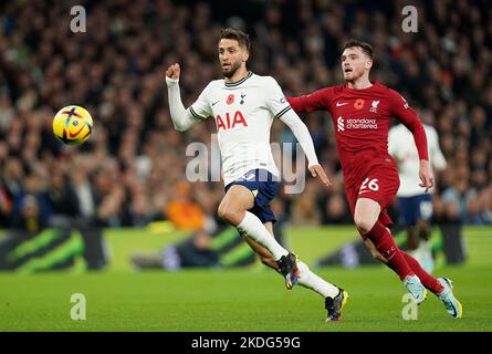 Tottenham Hotspur's Rodrigo Bentancur (left) attempts a shot on goal ...