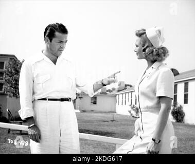 Director VINCENT SHERMAN and VIRGINIA MAYO on set location candid during filming of BACKFIRE ...