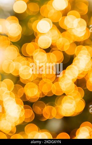 blurred, unfocused lights on christmas tree. Holiday winter holidays ...