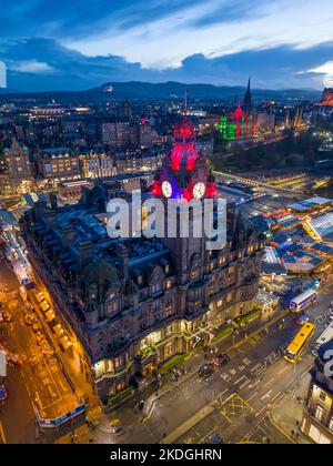 Aerial view of Balmoral Hotel and skyline of Edinburgh at dusk ...