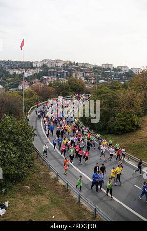 Runners compete in the 42 kilometer (26 mile) Beirut International ...
