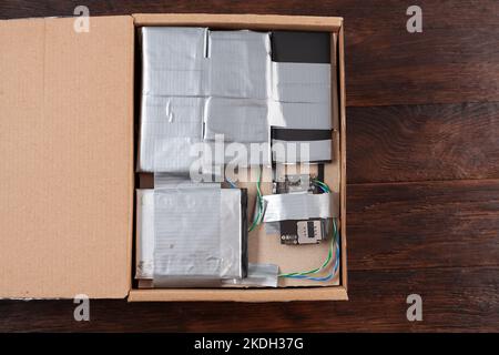 Hand made bomb with c4 and cell phone module in a cardboard box Stock ...