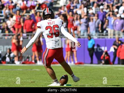 Texas Tech place kicker Trey Wolff, second from left, kicks the game ...