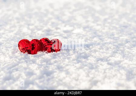 Valentines day card, snowflakes, hearts and toy bear on wooden table ...